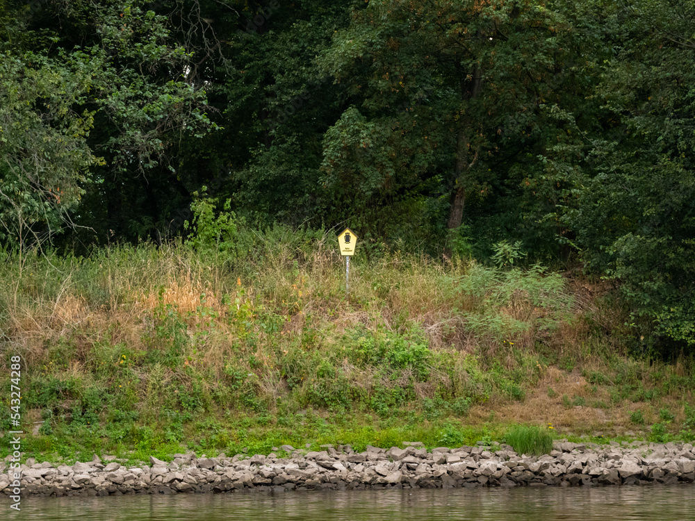German Naturschutzgebiet (nature reserve) sign in a natural area next ...