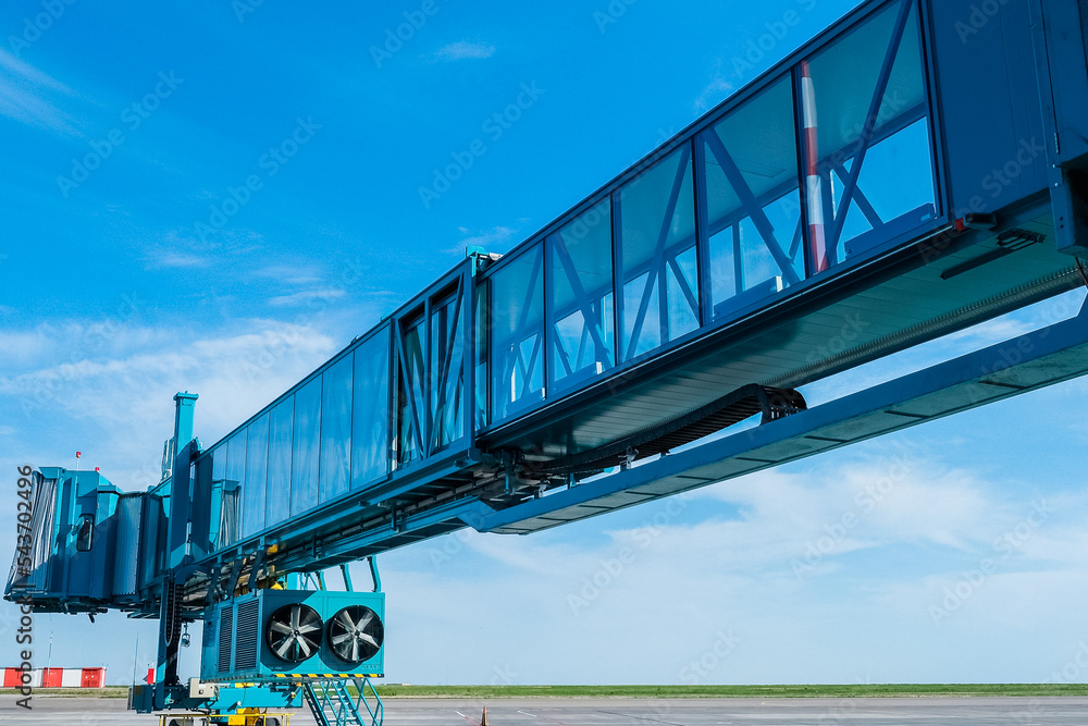 Jet bridge at the airport is brought to a large passenger plane Stock ...
