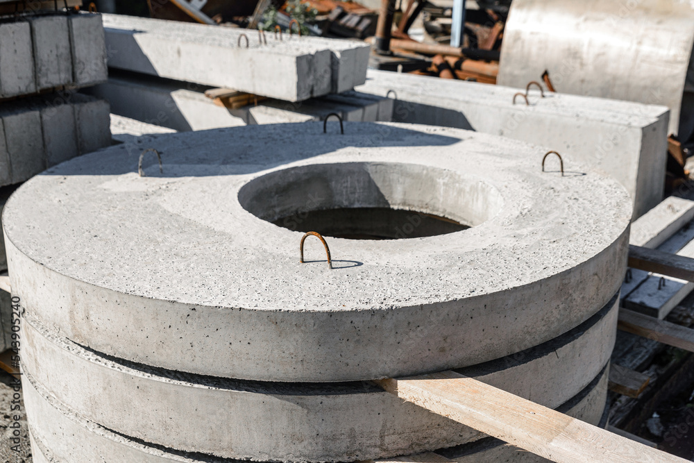 Round concrete cover of the well in the warehouse of the factory of ...