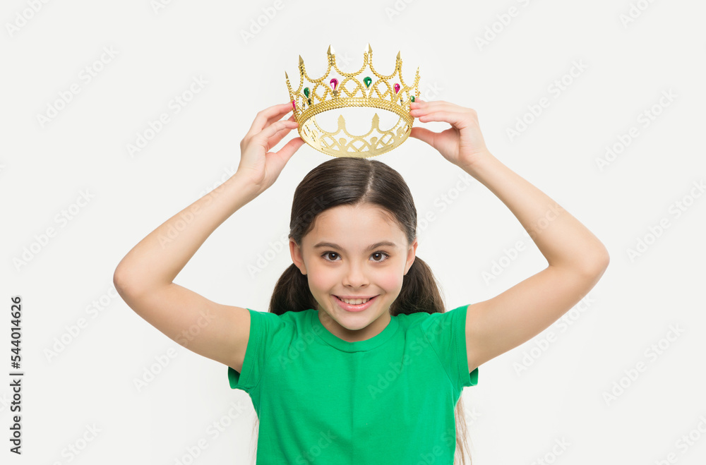 Behaving like princess is work. Kid wear golden crown symbol of ...