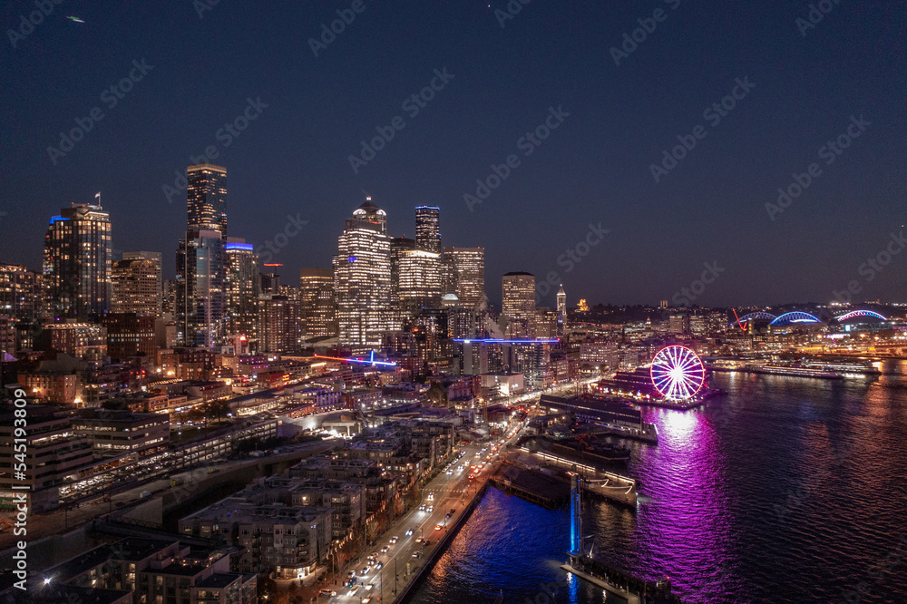 night aerial view of illuminated Seattle Downtown and the Waterfront ...