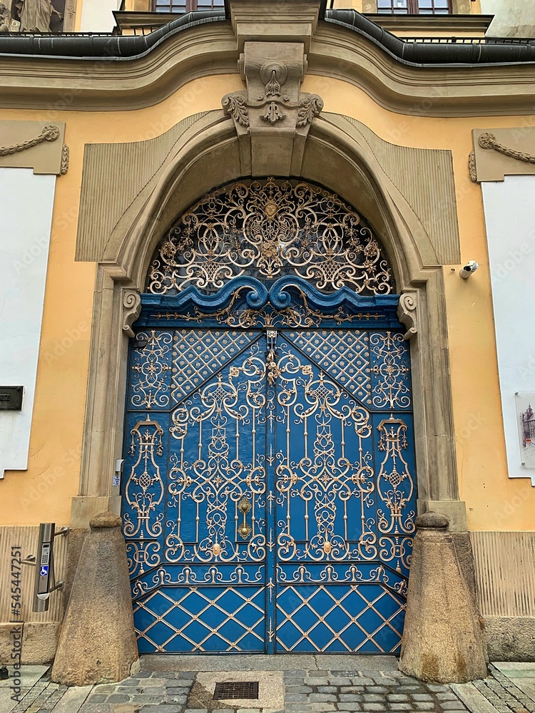 large door, historic entrance gate, blue gate with golden decorations ...