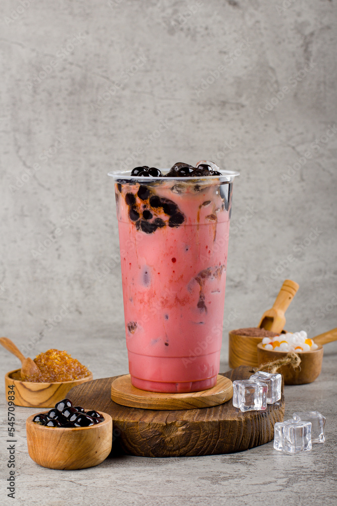 Boba or tapioca pearls is taiwan bubble milk tea in plastic cup with ...
