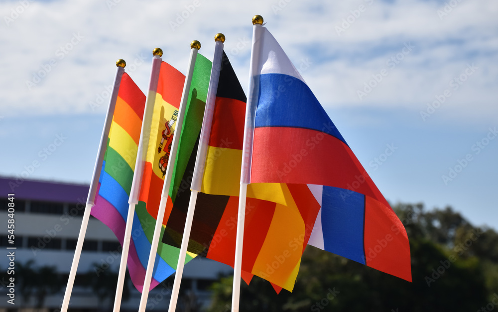 Rainbow flag and National flags of China, soft and selective focus ...