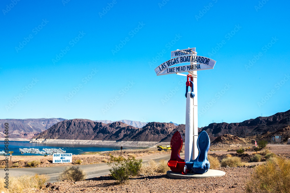 Las Vegas Boat Harbor. Lake Mead Marina signage at lake's shore ...