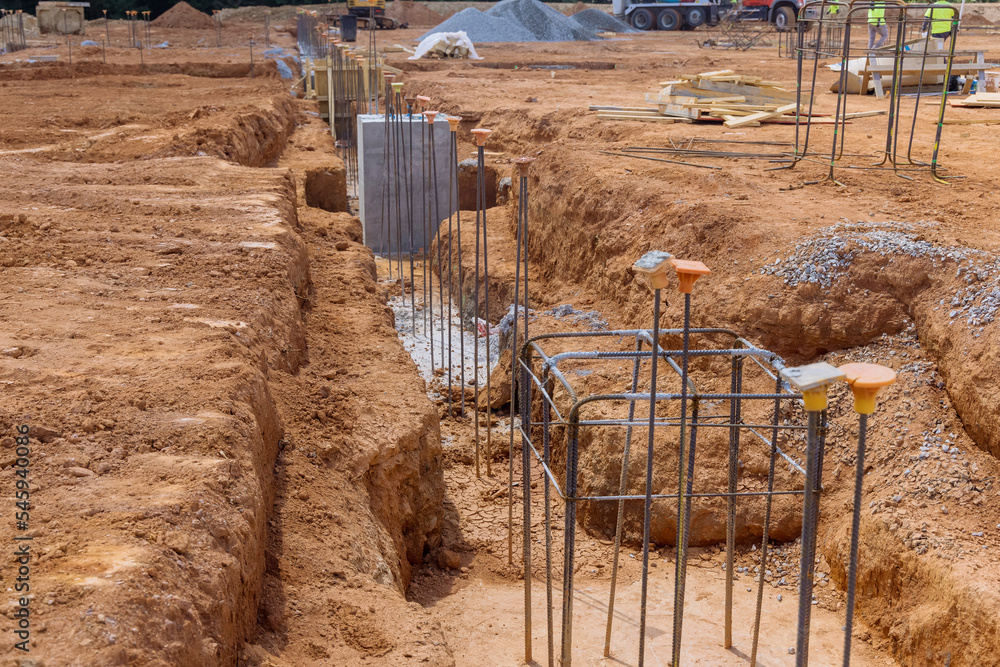 Trench for concrete foundation is reinforced with steel bars rebar ...