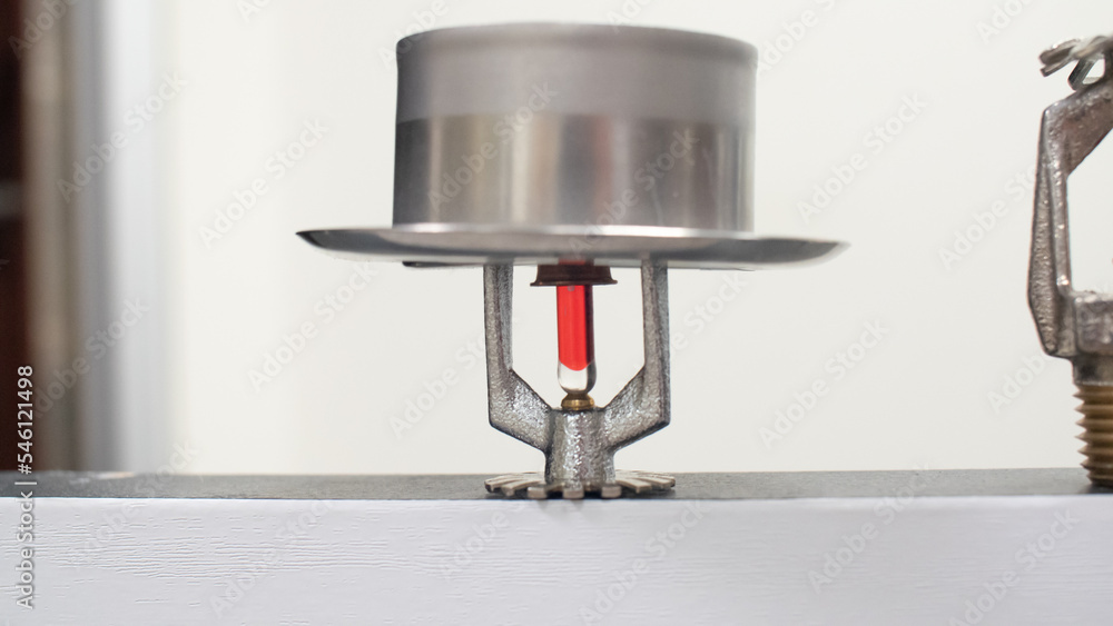 Fire sprinkler heads with fusible links and frangible bulbs Stock Photo ...