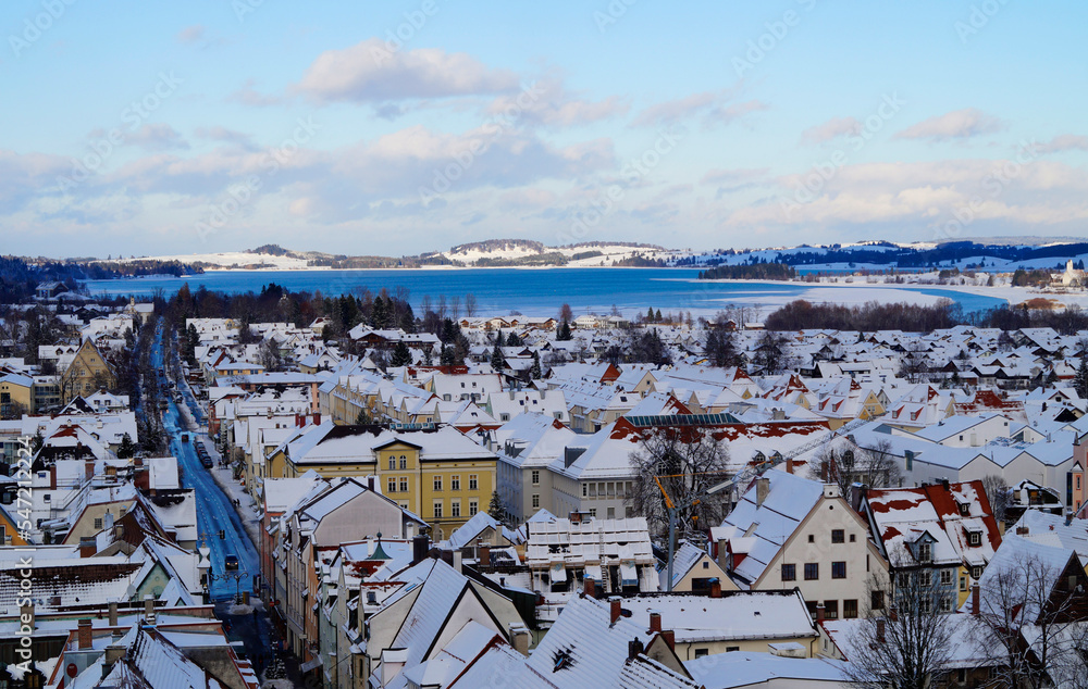 the wintery romantic ancient town of Fuessen in the scenic snowy ...