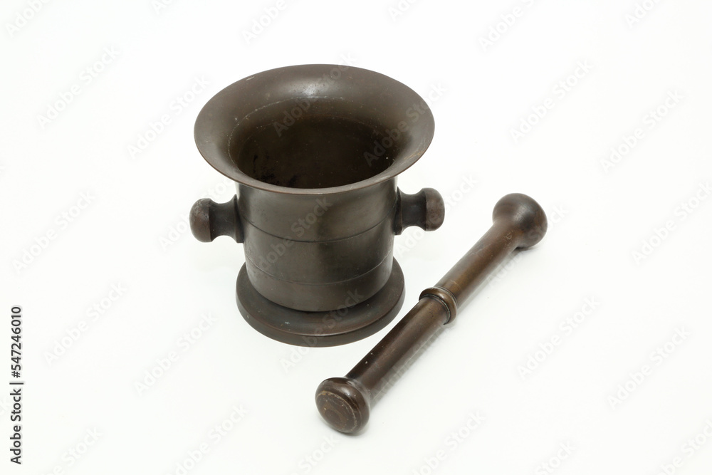 Antique mortar on a white background. Equipment of an ancient ...