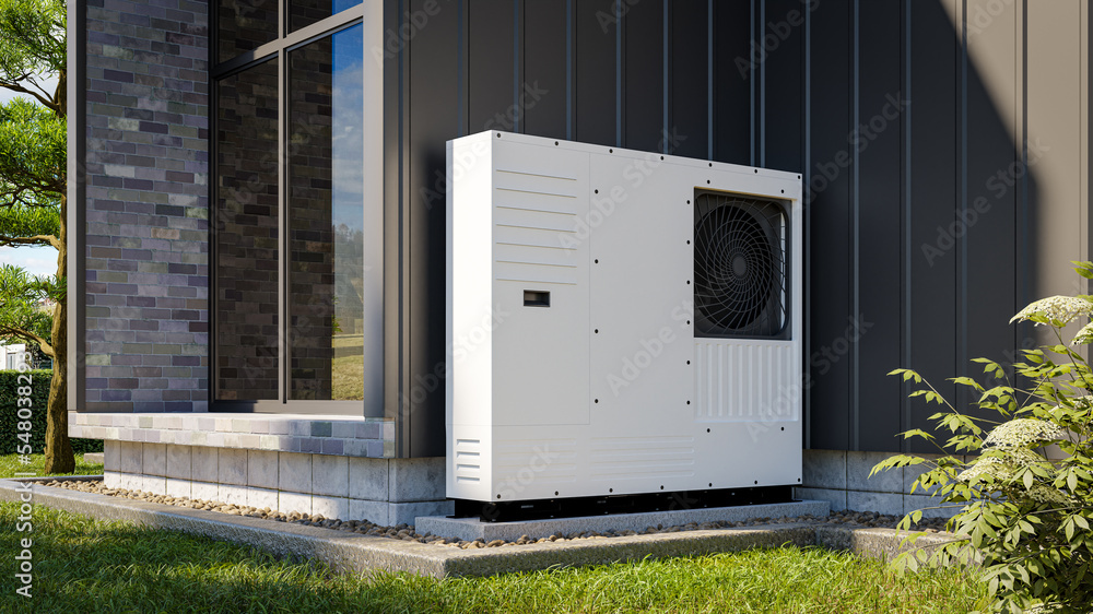 Heat pump installed at the wall of a single-family. house Image showing ...