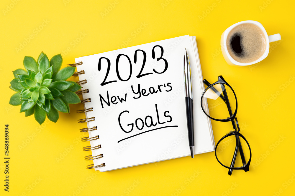New year resolutions 2023 on desk. 2023 resolutions list with notebook ...