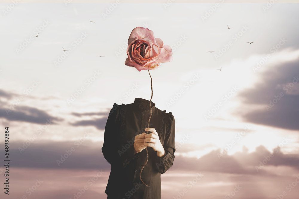 surreal woman holds a colored rose by a lace instead of the face ...
