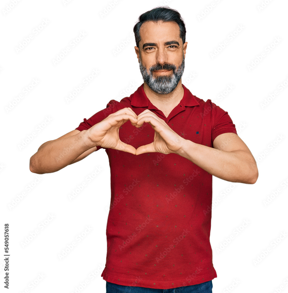 Middle aged man with beard wearing casual red t shirt smiling in love ...