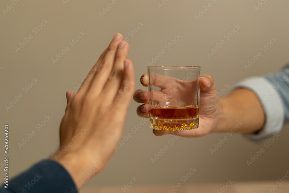 Foto de Stock Alcoholism, sad depressed asian young man, male hand ...