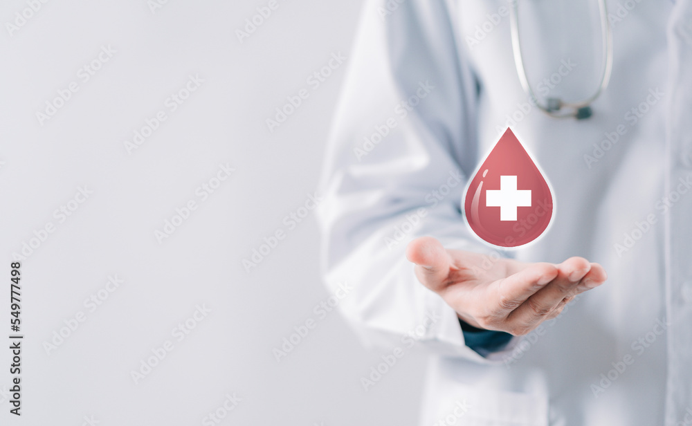 doctor in a white coat receive blood donation, blood transfusion, world ...