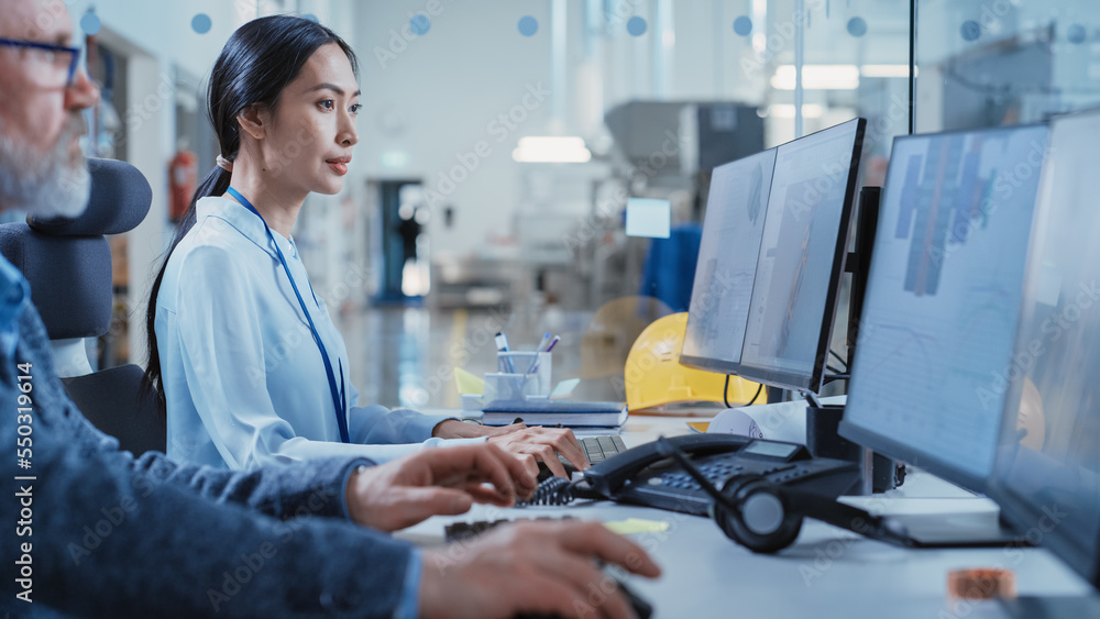 Factory Office Facility: Industrial Engineers Drafting Blueprints of a ...