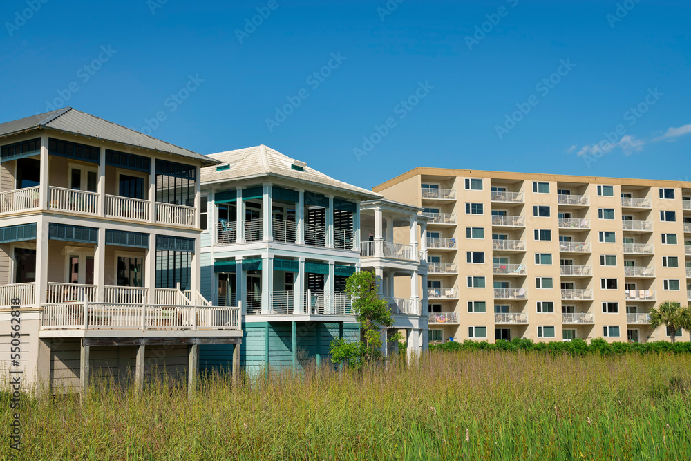 Destin, Florida- View of three-storey houses with view deck and ...