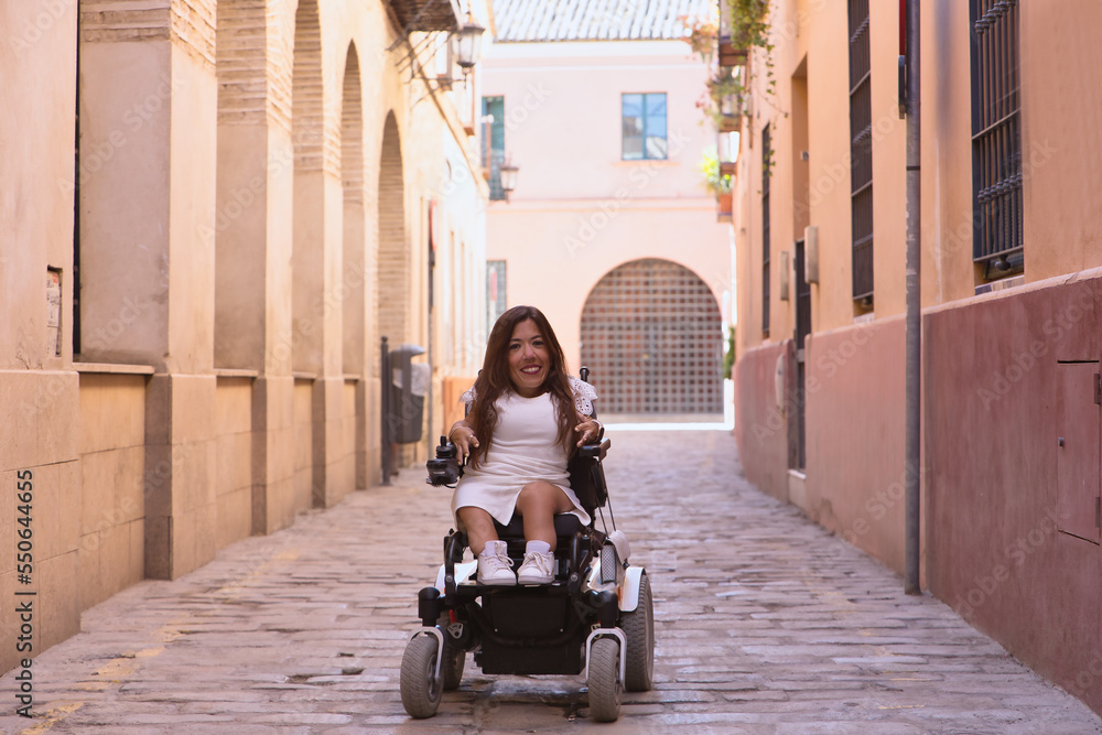 Woman with disability, reduced mobility and small stature in an ...