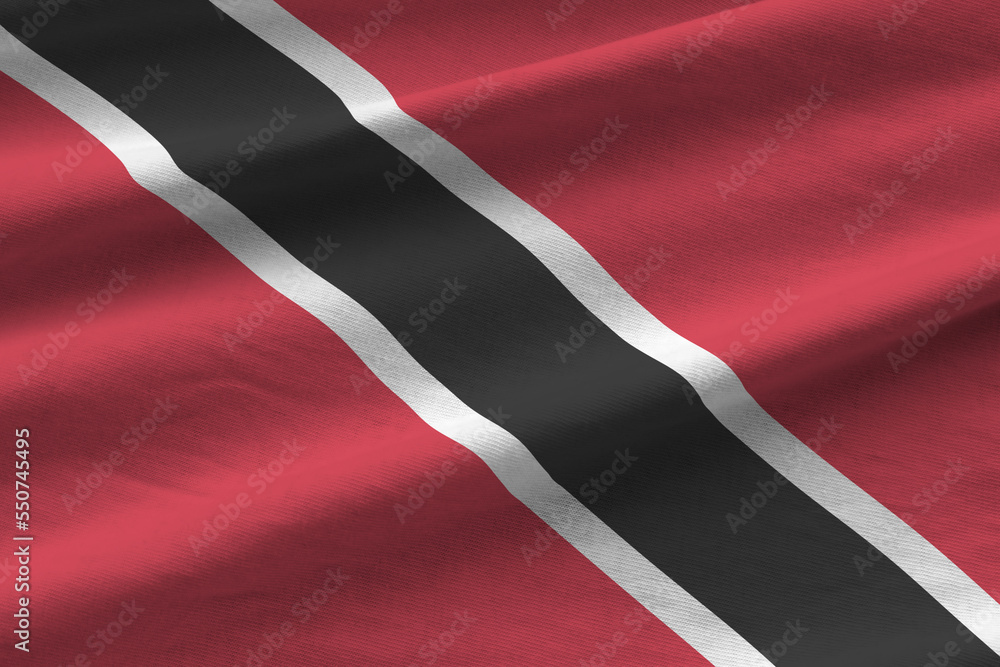Trinidad and Tobago flag with big folds waving close up under the ...
