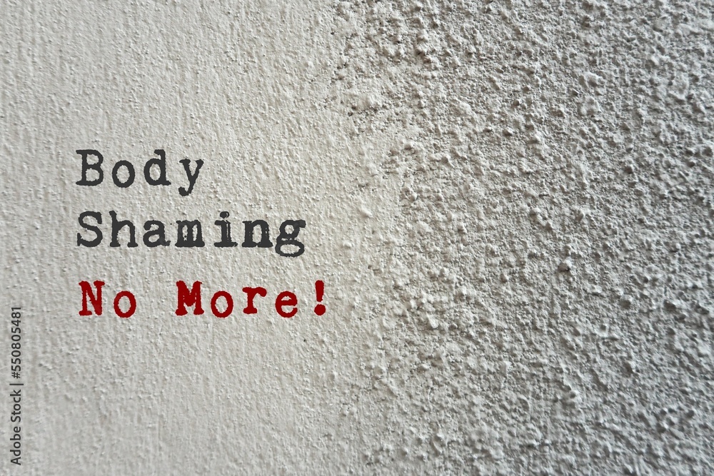 Grey cement concrete rough texture wall background with text BODY ...