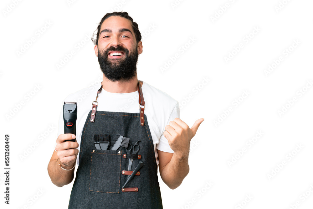 Young barber man over isolated chroma key background pointing to the ...