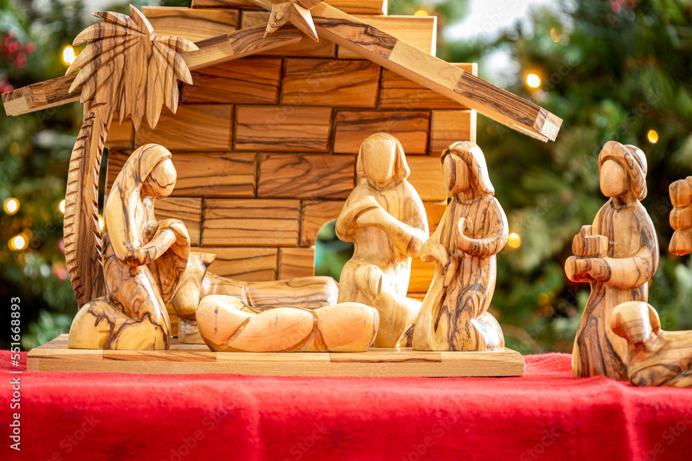 Nativity Creche Made of Olive Tree Wood Against a Lighted Background ...