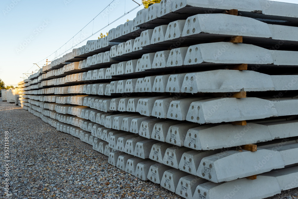 Stacks of concrete railway sleepers at the construction site of a new ...