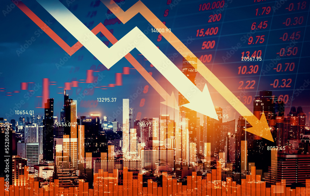 Economic crisis concept shown by declining graphs and digital ...
