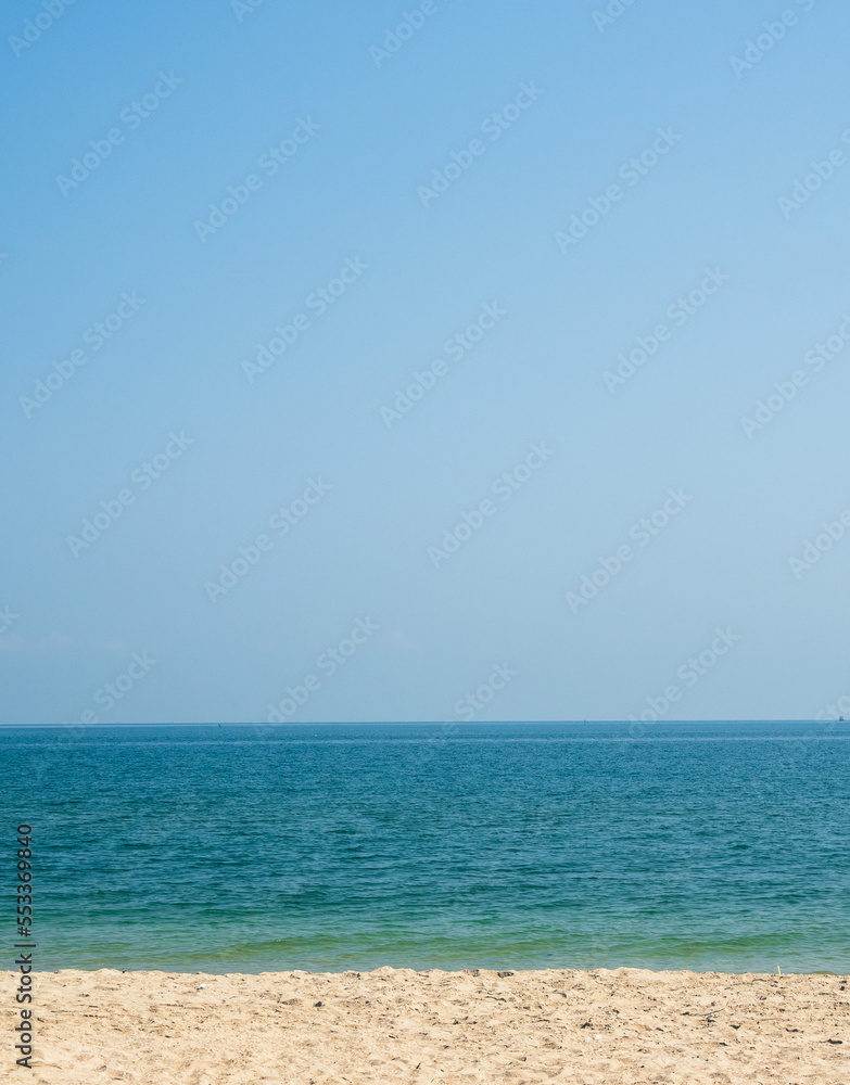 Vertical front view landscape Blue sea blue beach brown background ...