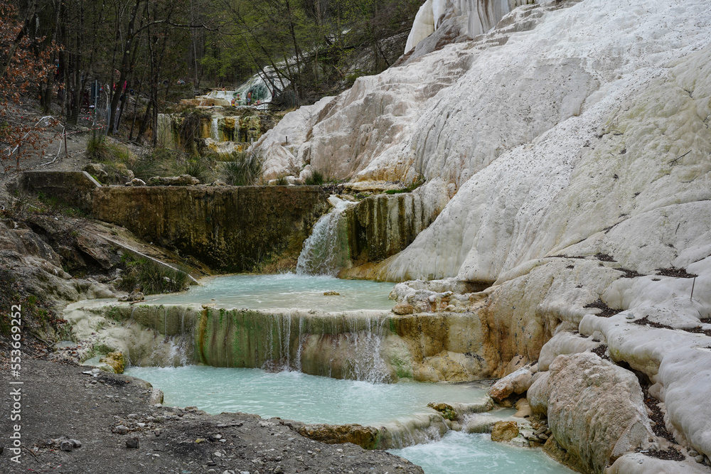 Hot springs at Bagni San Filippo, with calcium carbonate deposits ...