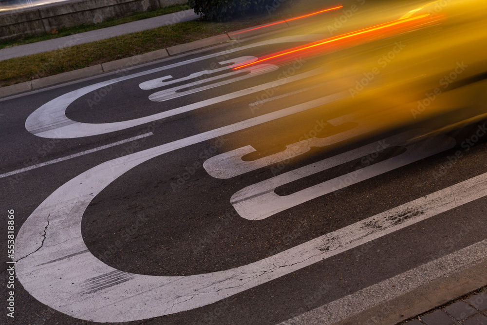 Acceleration of vehicle on speed limit sign. Image in movement, burst ...