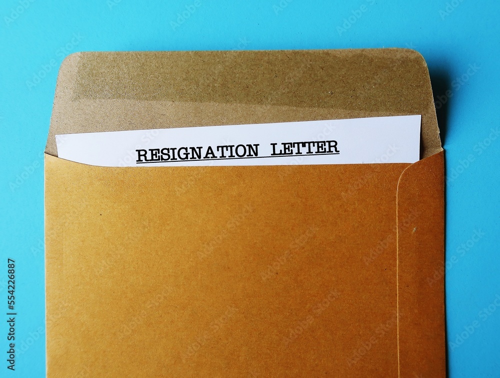 Office envelope with document typed RESIGNATION LETTER, concept of ...