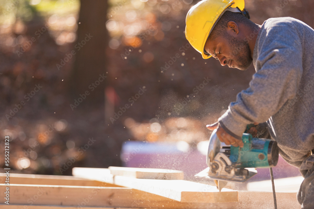 Carpenter cutting bevels using a circular saw Stock Photo | Adobe Stock Carpenter cutting bevels using a circular saw Stock Photo | Adobe Stock