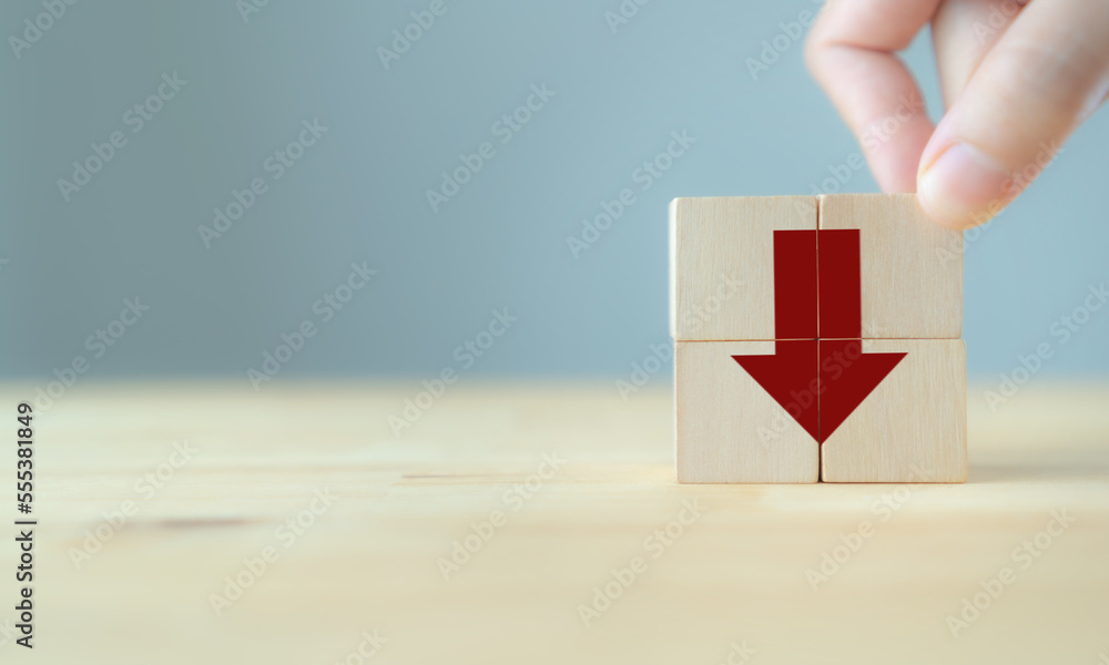 Red arrow points down sign on wooden cube blocks and copy space ...