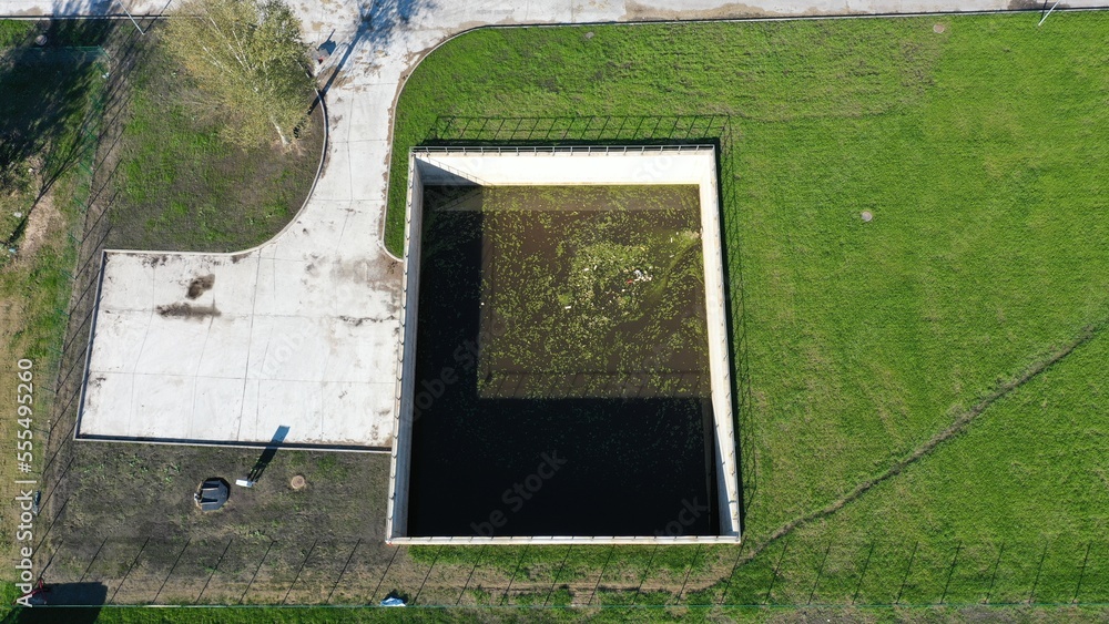 Photo Stock Sanitary pit for drainage of water, livestock feces, manure ...