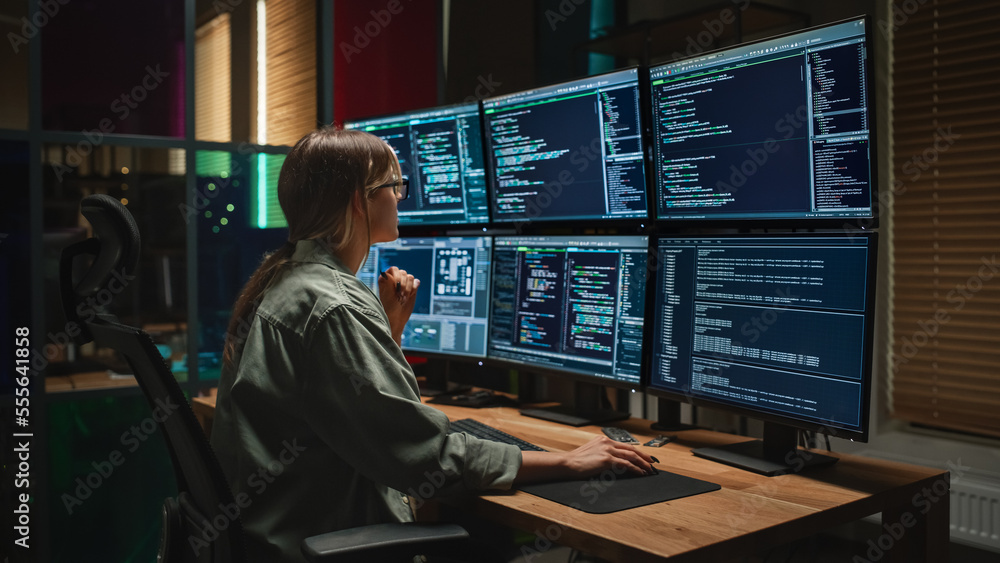 Cyber Security Agency: Female Programmer Coding on Desktop Computer With Six Displays in Dark ...