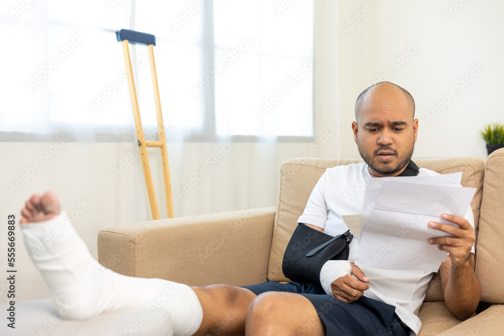 UnHappy man stressed pay invoice medical expenses from accident ...