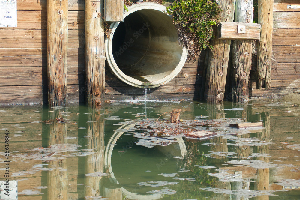 water pollution from sewer pipe draining into the lagoon Stock Photo ...