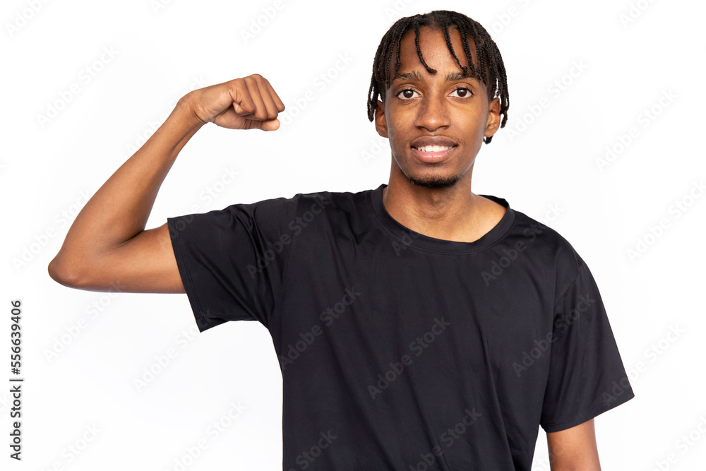 Confident young man showing his arm muscle. Male African American model ...