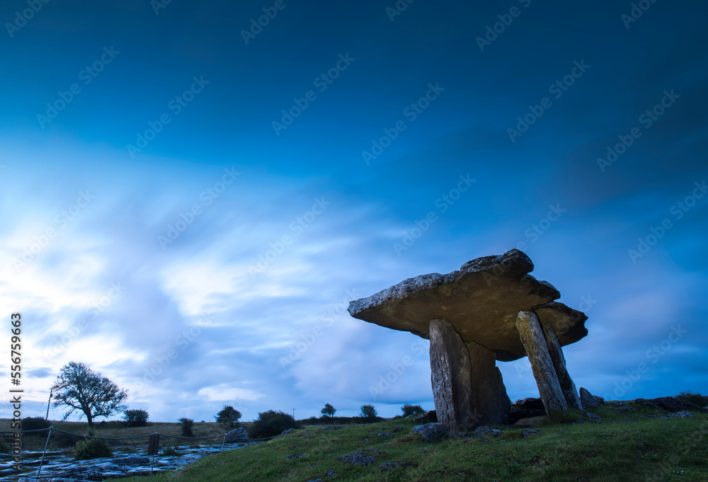 The megalithic portal tomb of Poulnabrone Dolmen with rocky karst ...