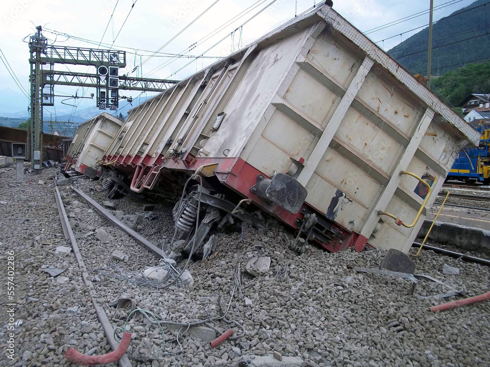 Massive freight train derailed along the tracks. Tracks, freight ...