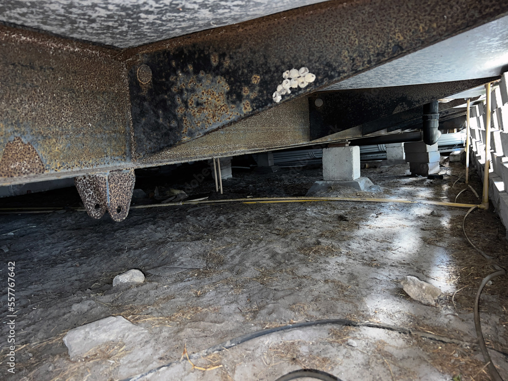 Crawl space under brick lifted manufactured home Stock Photo | Adobe Stock