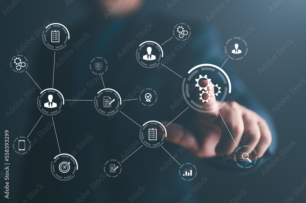 technology business, manager touching gears icons. operations system management involving ...