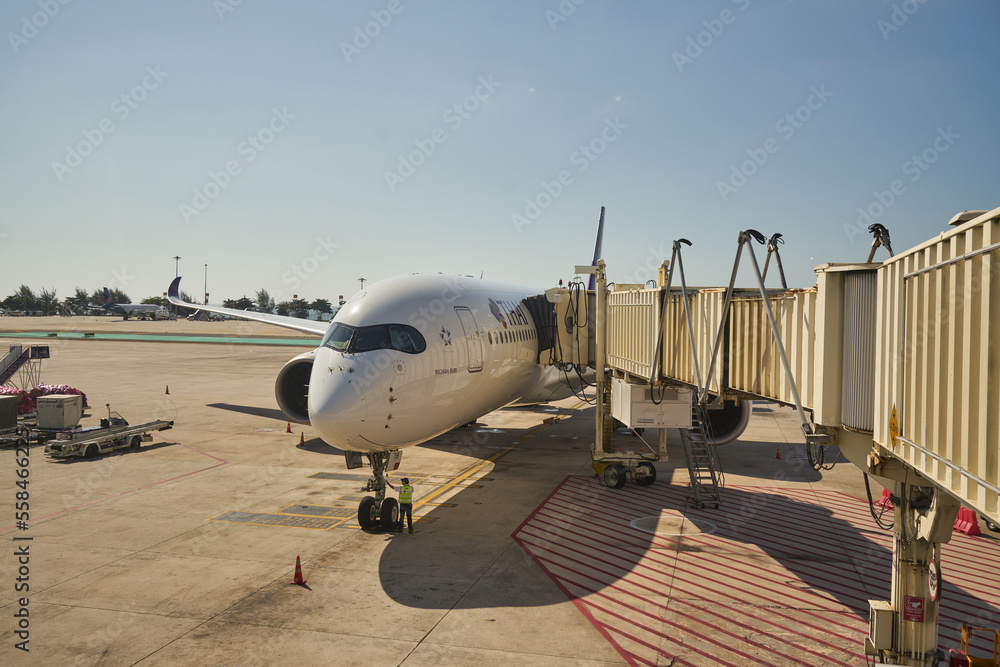 PHUKET, THAILAND - CIRCA JANUARY, 2020: passenger boarding bridge and ...
