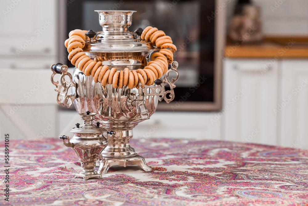 Russian traditions. Tea drinking with a samovar. Still life with bagels ...