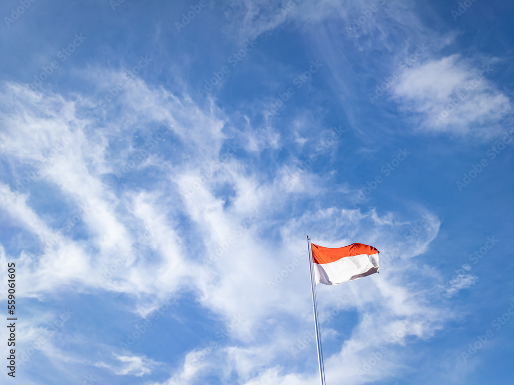 The Merah Putih Flag. View from below. Indonesian flag consist of red ...