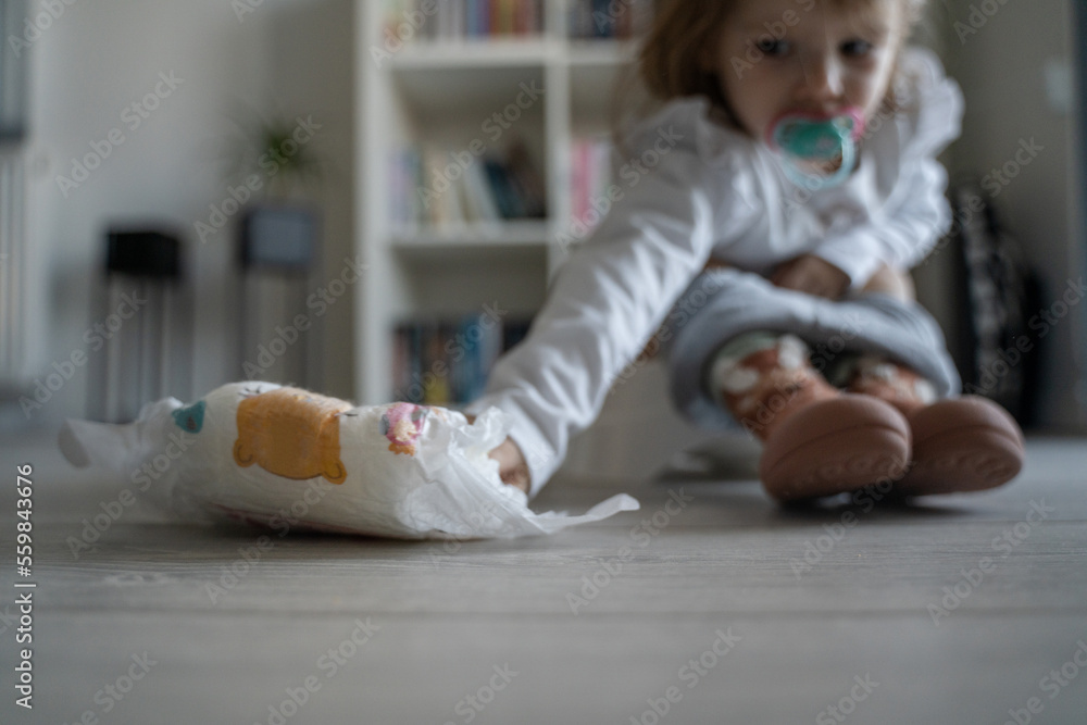 potty training small caucasian girl toddler child sitting on the potty ...