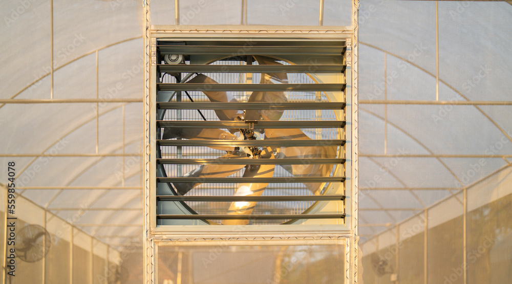 Modern mounted cassette type air conditioner fan in farm. Outdoor ...