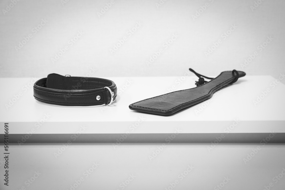 Paddle, collar on the table. Domestic discipline. Traditional corporal ...
