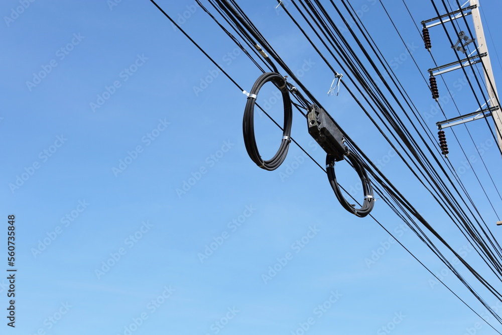 Internet box and cable reel. Old black plastic box combines high speed ...